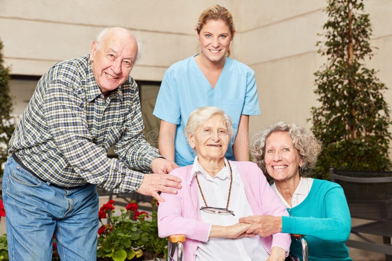 Seniors and a Geriatric Nurse Celebrate Together Stock Photo - Image of ...
