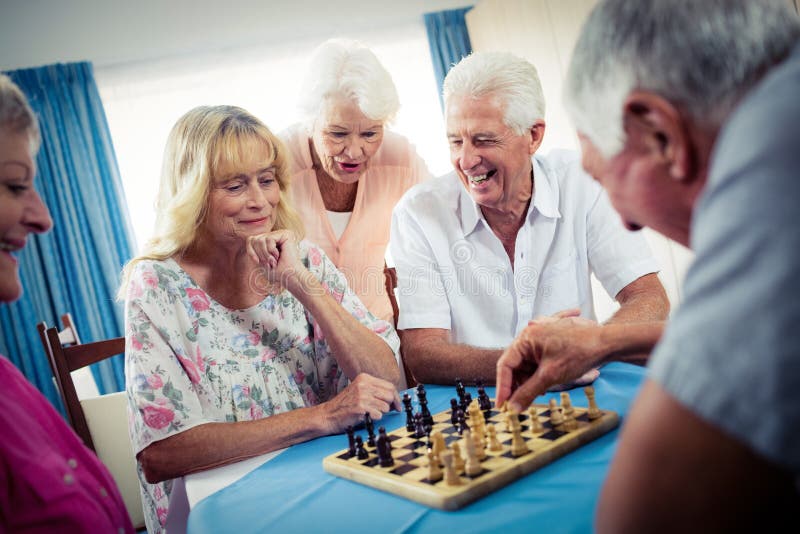 Group of Seniors Playing Chess Stock Photo - Image of interacting ...