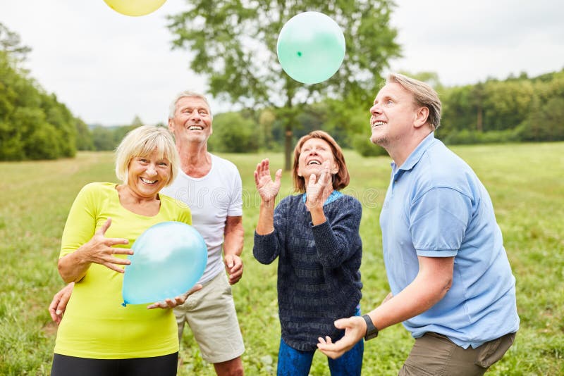 Group of Seniors Plays with Balloons Stock Image - Image of seniors ...