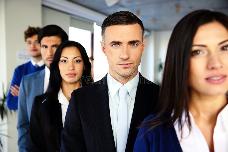 7,648 Group Serious Standing Stock Photos - Free & Royalty-Free Stock ...