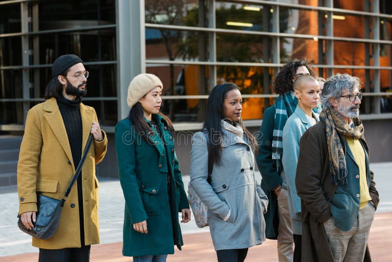 Group of Serious Businessmen and Women Standing Looking Forward Stock ...