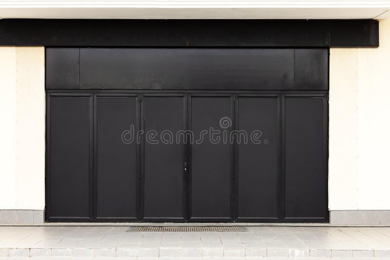 Black Entry Doors. Several Black Iron Doors Front View Stock Photo ...
