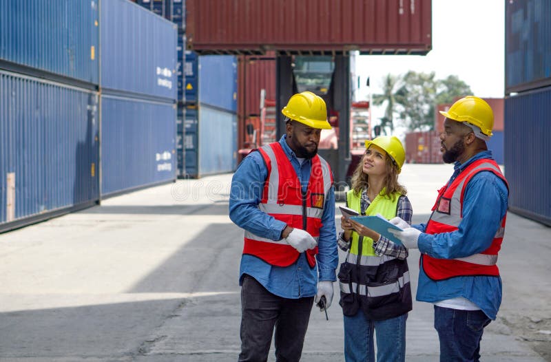 Group of Shipment Worker Dressed in Hardhat, Safety Vest and Protective ...
