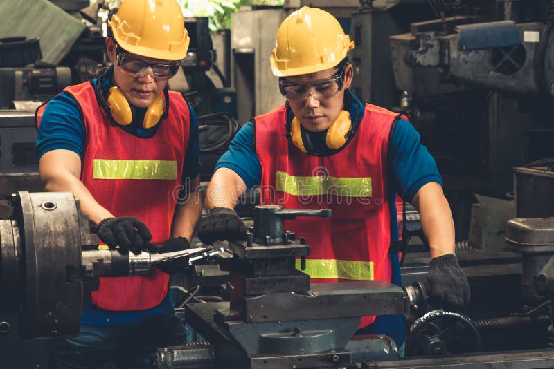Skillful Worker Celebrate Success in the Factory . Stock Photo - Image ...