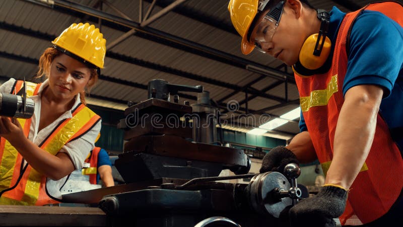 Group of Skillful Workers Using Machine Equipment in Factory Workshop Stock Image - Image of ...