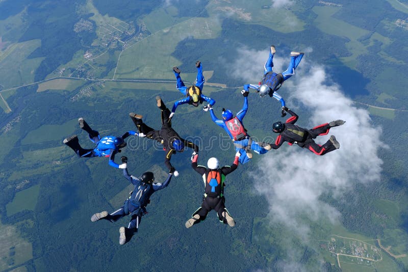 A Group of Skydivers Above White Big Cloud. Stock Image - Image of ...