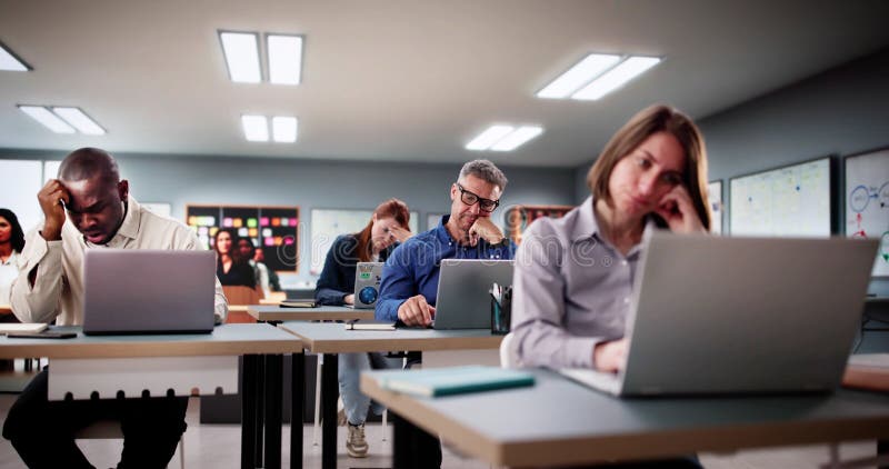 Group of Sleepy Students Struggling through Boring Lecture in Classroom ...