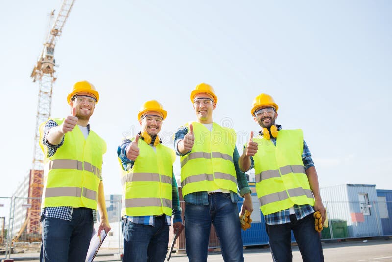 Group of Smiling Builders with Tablet Pc Outdoors Stock Photo - Image ...