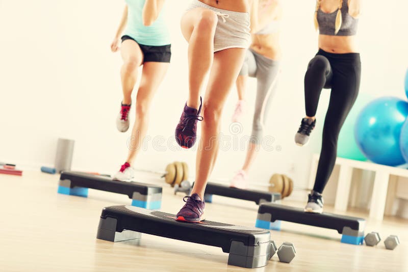 Group of Smiling People Doing Aerobics Stock Photo - Image of teamwork ...