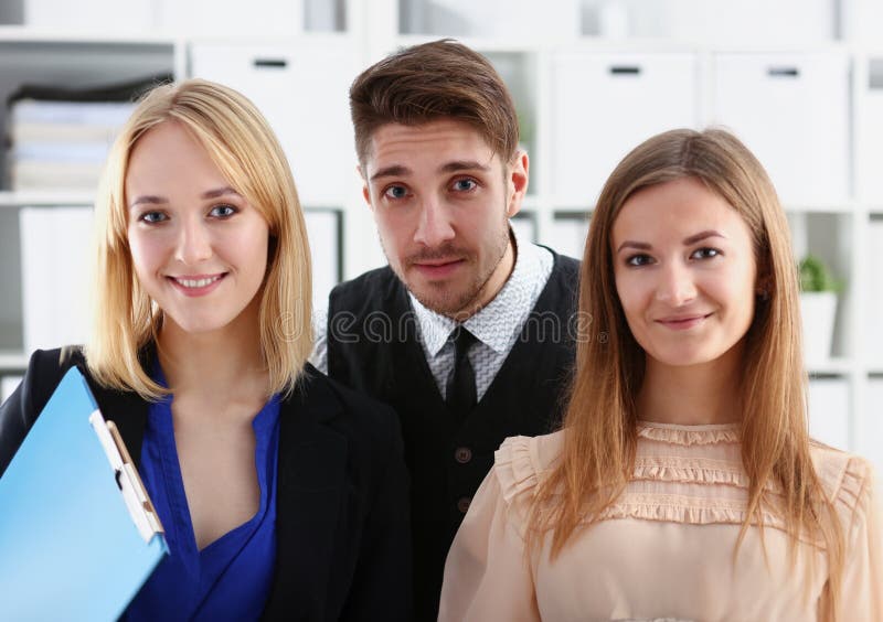 Group of Smiling People Stand in Office Looking in Camera Stock Image ...