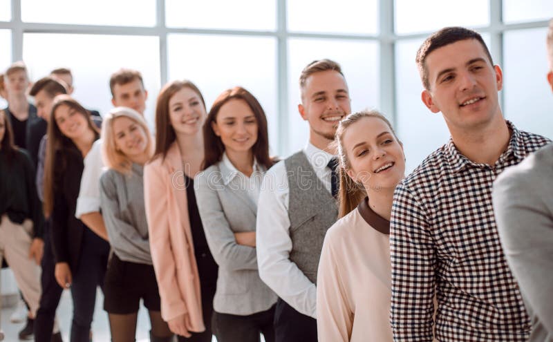 Group of Smiling Young Professionals Standing in a Row. Stock Image ...