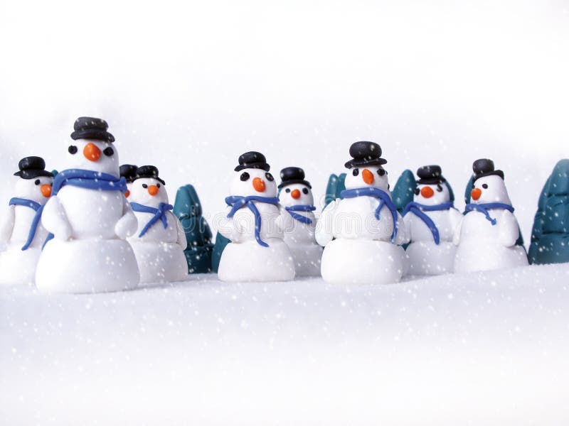 A Group of Snowmen in the Snow Stock Image - Image of funny, snow: 17377349