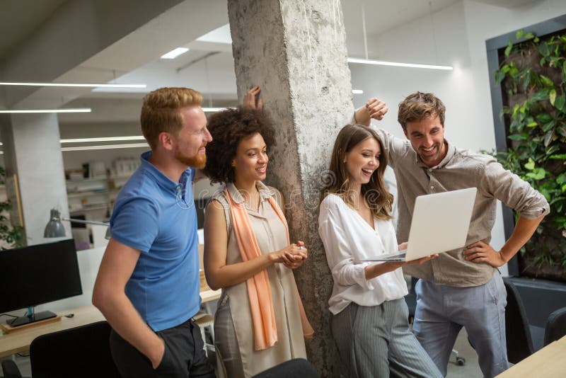 Group of Software Engineers Working Developing Applications Together in ...