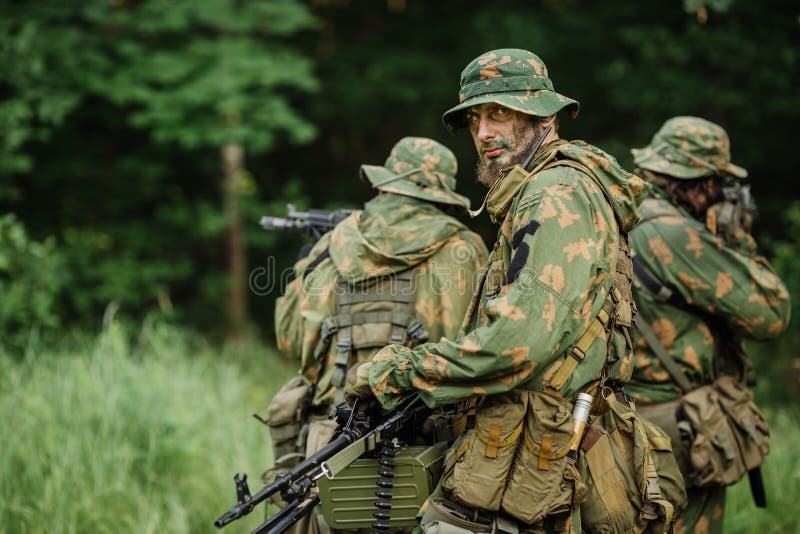Group Of Soldiers Special Forces During The Raid In The Forest Stock ...