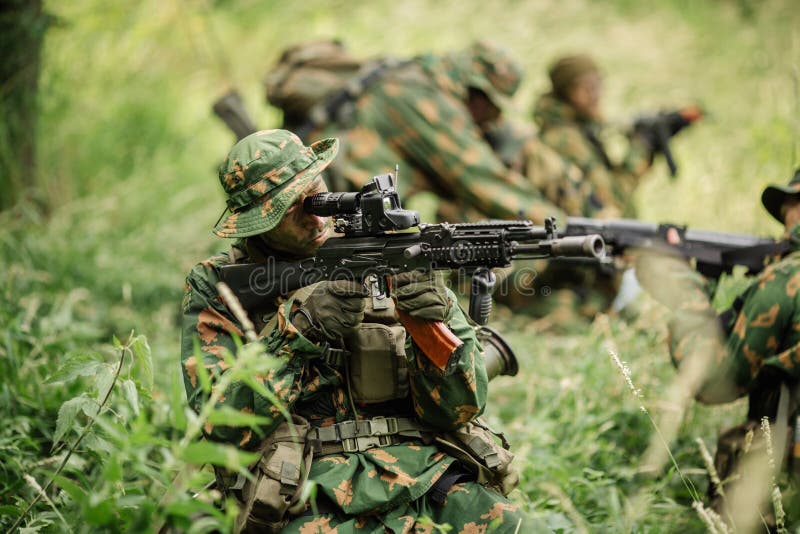Group of Soldiers Special Forces during the Raid in the Forest Stock ...