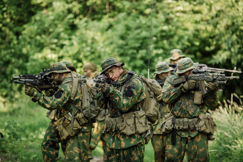 Group of Soldiers Special Forces during the Raid in the Forest Stock ...