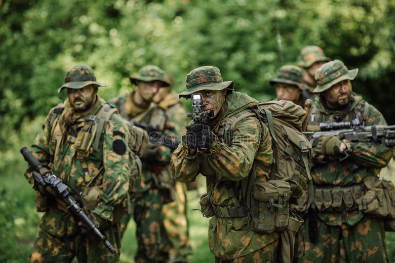 Group of Soldiers Special Forces during the Raid in the Forest Stock ...