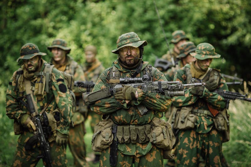 Group of Soldiers Special Forces during the Raid in the Forest Stock ...