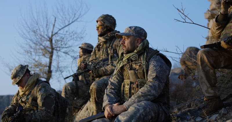Group Soldiers Taking a Break during an Assault Stock Image - Image of ...