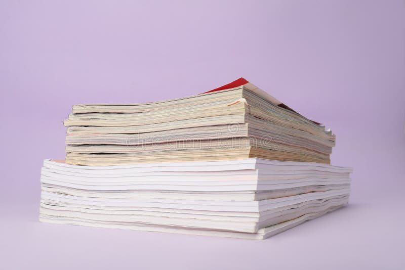 Group of Stacked Magazines on Violet Background Stock Photo - Image of ...