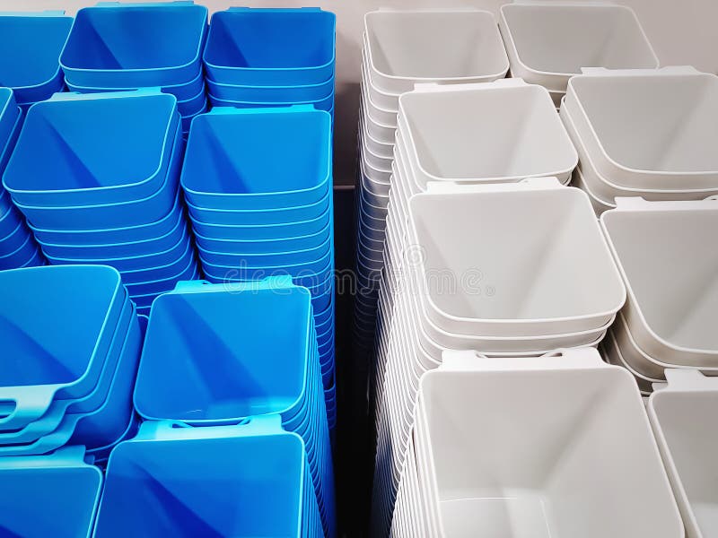 Group of Stacked White and Blue Plastic Containers for Sale Stock Photo ...