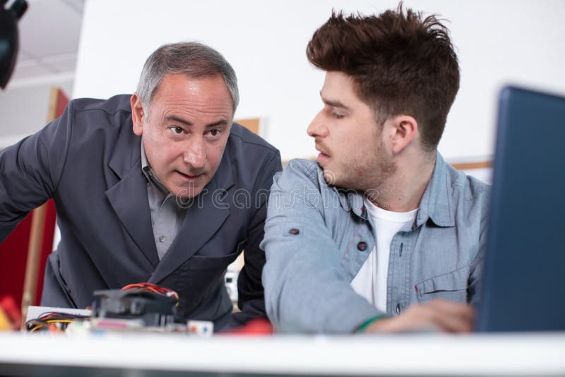 Group Student Doing Technical Vocational Practice with Teacher Stock ...