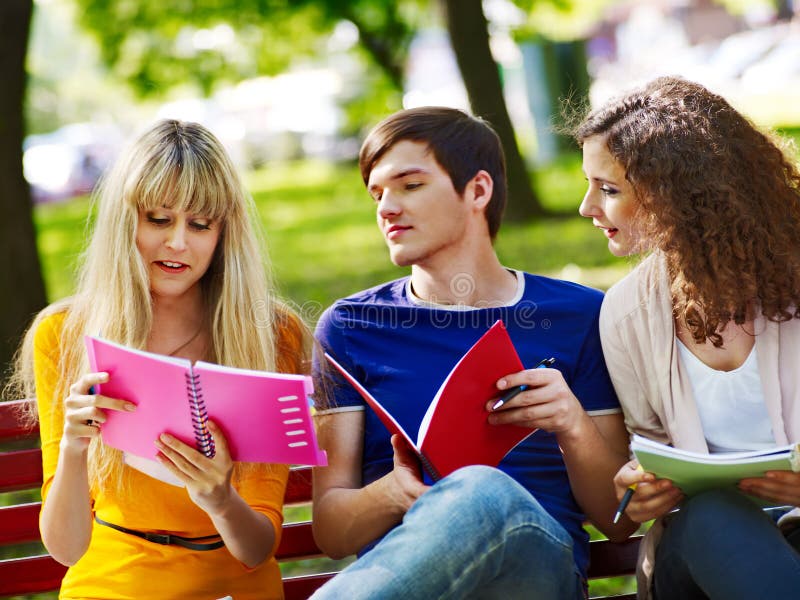 Group Student with Notebook on Bench Outdoor. Stock Photo - Image of ...