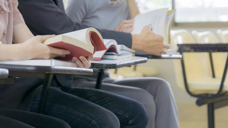 Group Student Read Book and Sit in Classroom Stock Image - Image of ...
