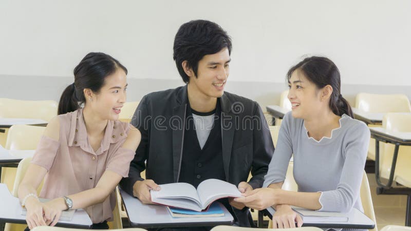 Group Student Read Book and Sit in Classroom Stock Image - Image of ...