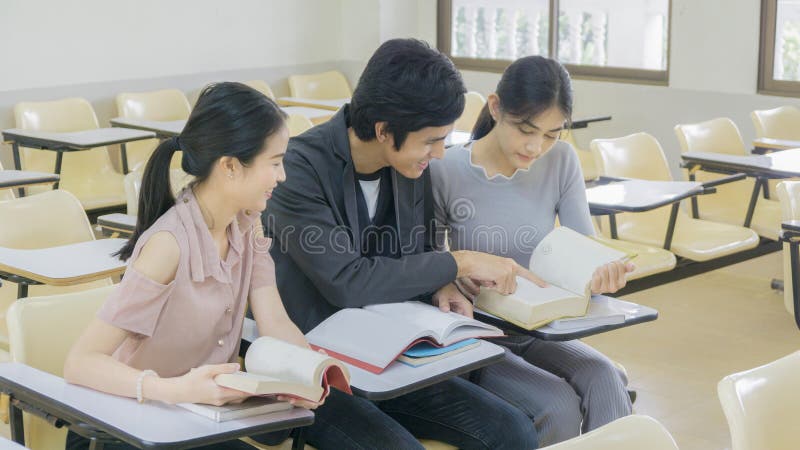 Group Student Read Book and Sit in Classroom Stock Image - Image of ...