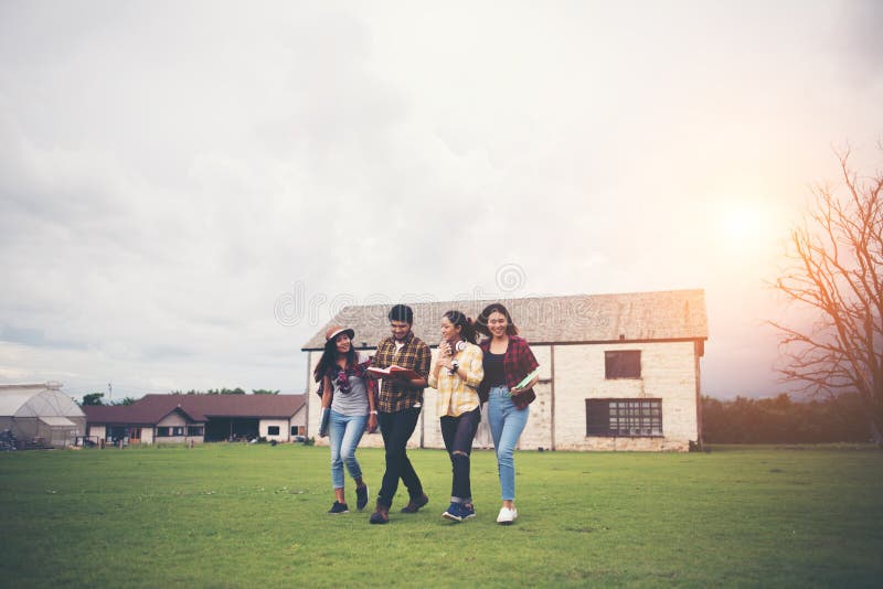 Group of Student Walking through the Park after Class. Stock Photo ...