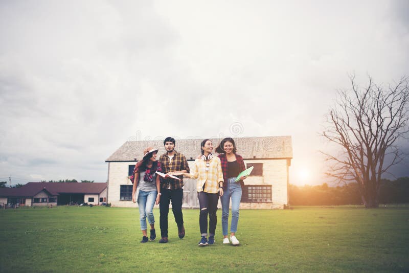 Group of Student Walking through the Park after Class. Stock Image ...
