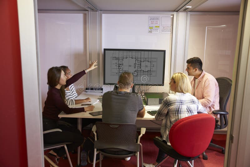 Group of Students Around Screen Collaborating on Project Stock Photo ...