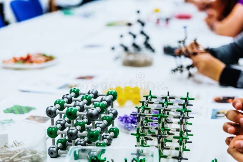 Group of Students in Biology Class Creating Molecular Models with ...