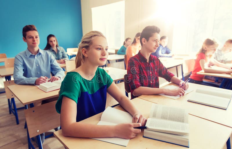 Group of Students with Books at School Lesson Stock Photo - Image of ...