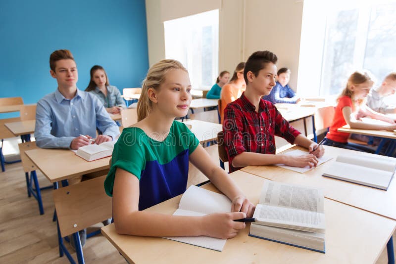 Group of Students with Books at School Lesson Stock Image - Image of ...