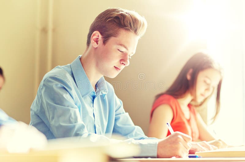 Group of Students with Books Writing School Test Stock Photo - Image of ...