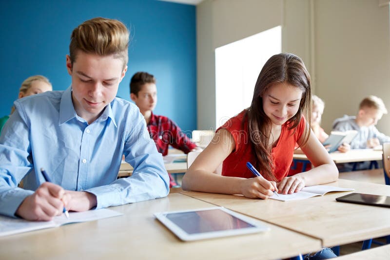 Group of Students with Books Writing School Test Stock Image - Image of ...