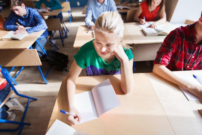 Group of Students with Books Writing School Test Stock Image - Image of ...