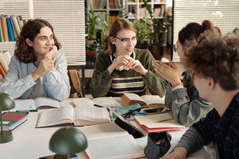 Group Students Chatting Cheerfully Working Desk School Library Stock ...