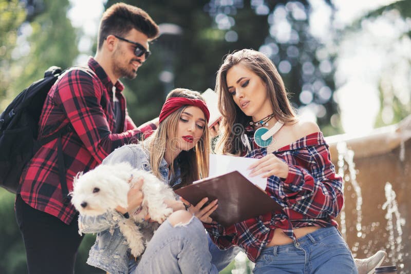 Group of Students Chatting Together Outdoors Stock Photo - Image of ...