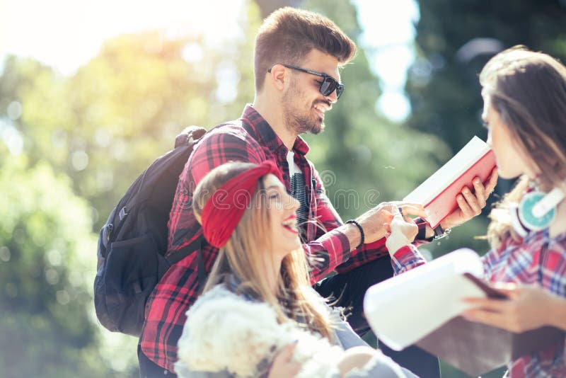 Group of Students Chatting Together Stock Image - Image of students ...