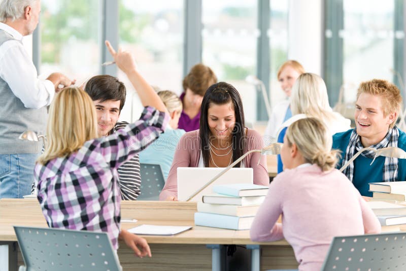 Group of Students in Classroom Stock Photo - Image of hands, raised ...