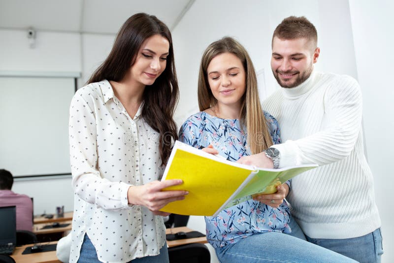 Group of Students in the Classroom Reading Stock Photo - Image of ...