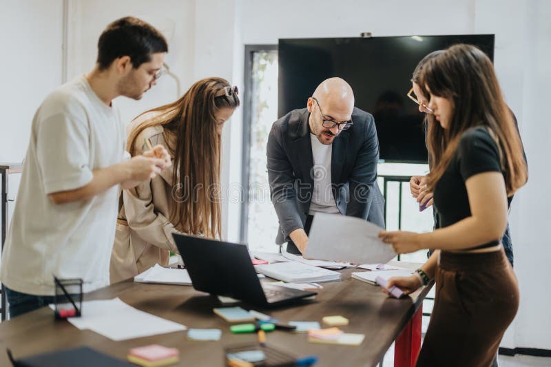 Students and Professor Collaborating on a Project in a Modern Classroom ...