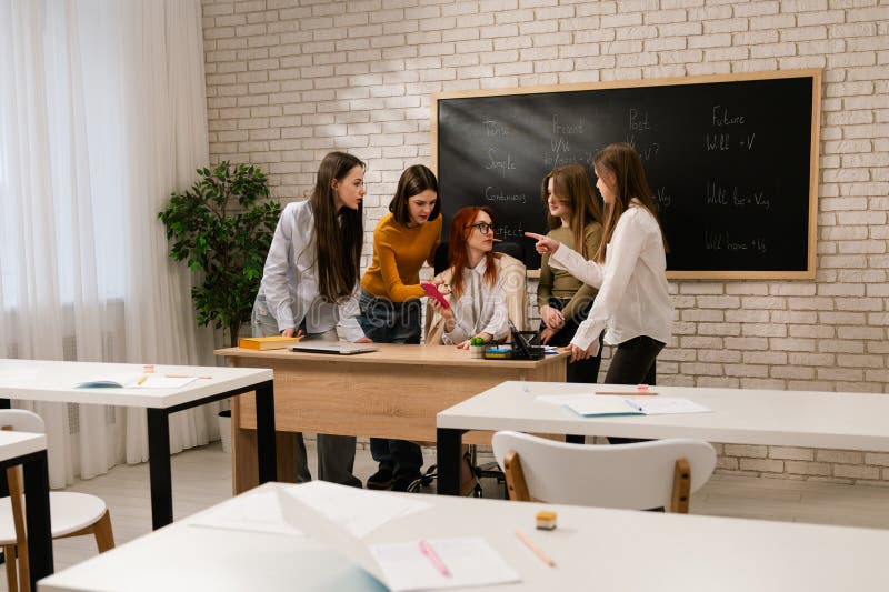 Group of Students Collaborating on a Classroom Project Together Stock ...