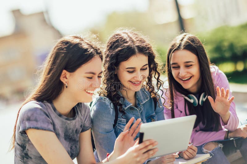 Students with Digital Tablet Studying Together Outdoors Stock Image ...