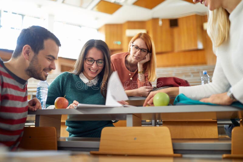 Students Discussing Assignments Stock Photo - Image of discussion ...