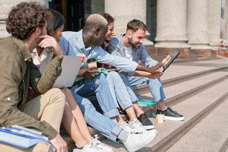 Group of Students Discussing a Group Project . Stock Photo - Image of ...