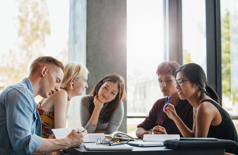 Group of Students Doing School Assignment in Library Stock Image ...